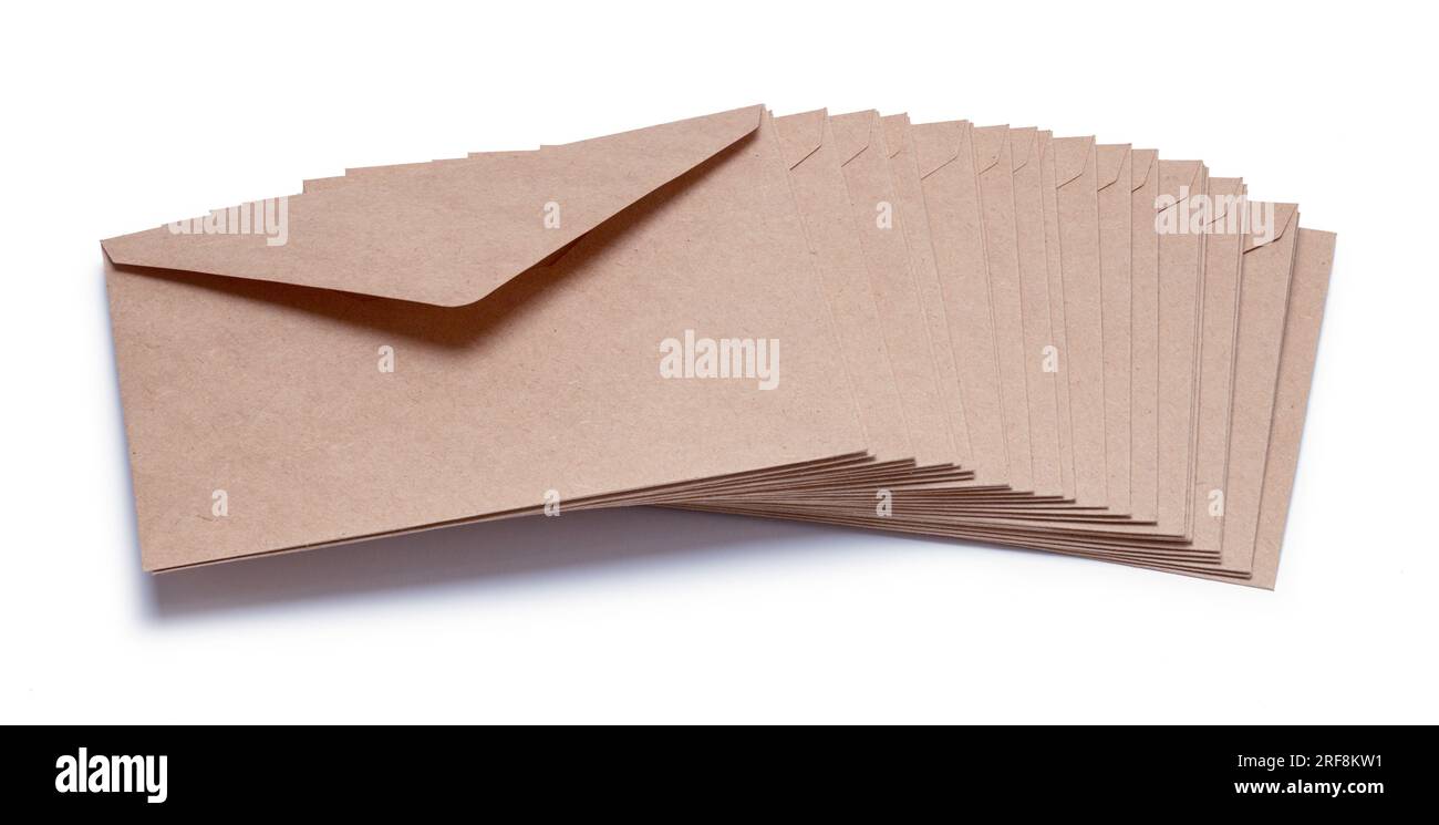 Sliding Pile of Brown Envelopes Cut Out on White Stock Photo - Alamy