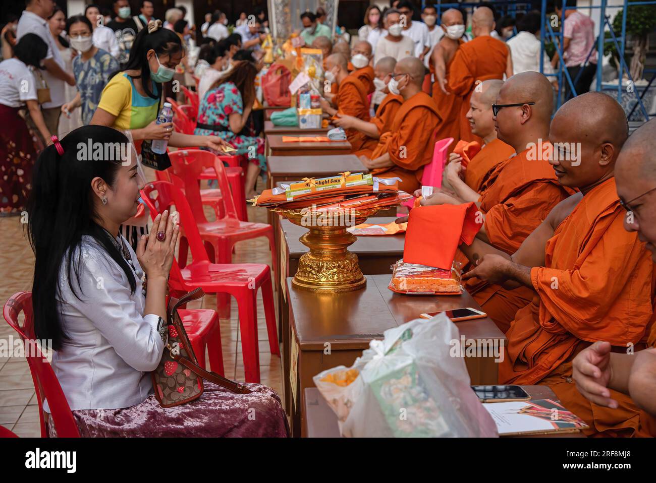Bangkok, Thailand. 01st Aug, 2023. Thai Buddhist devotee pays respect ...