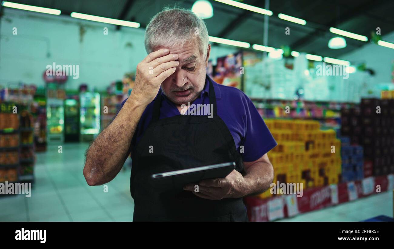 Stressed business owner of supermarket chain feeling pressure facing ...