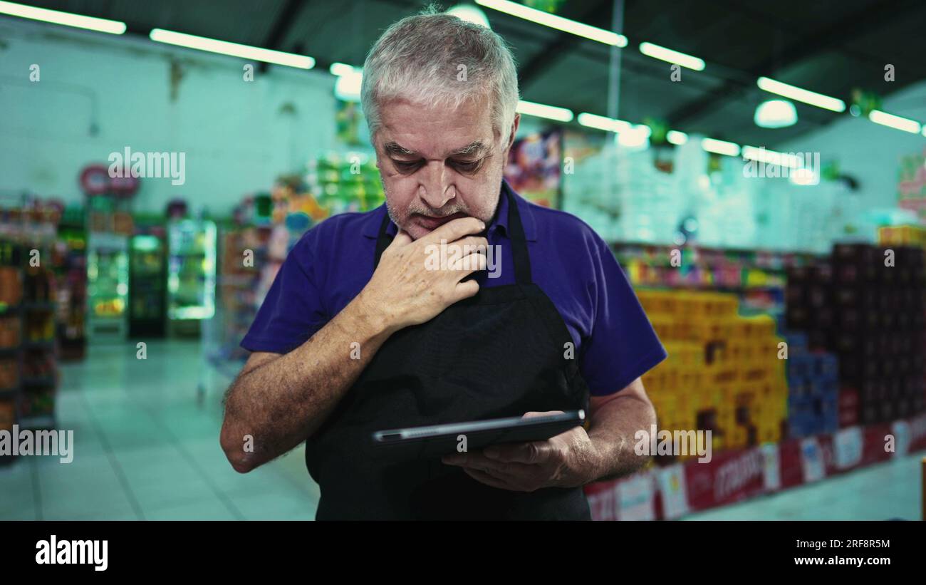 Stressed business owner of supermarket chain feeling pressure facing ...