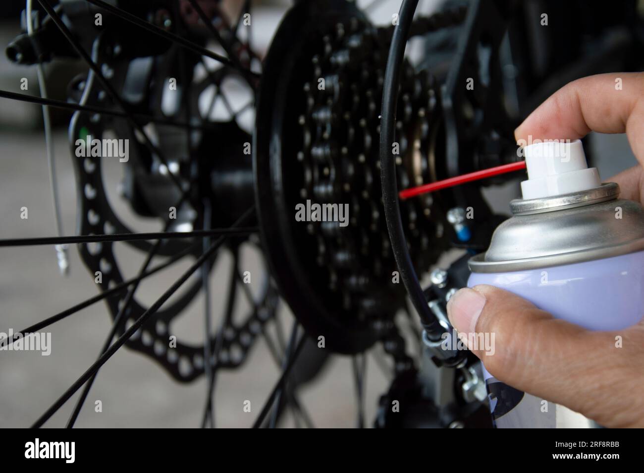 Bicycle gear lubricant spray to prevent rust and reduce humidity Stock ...