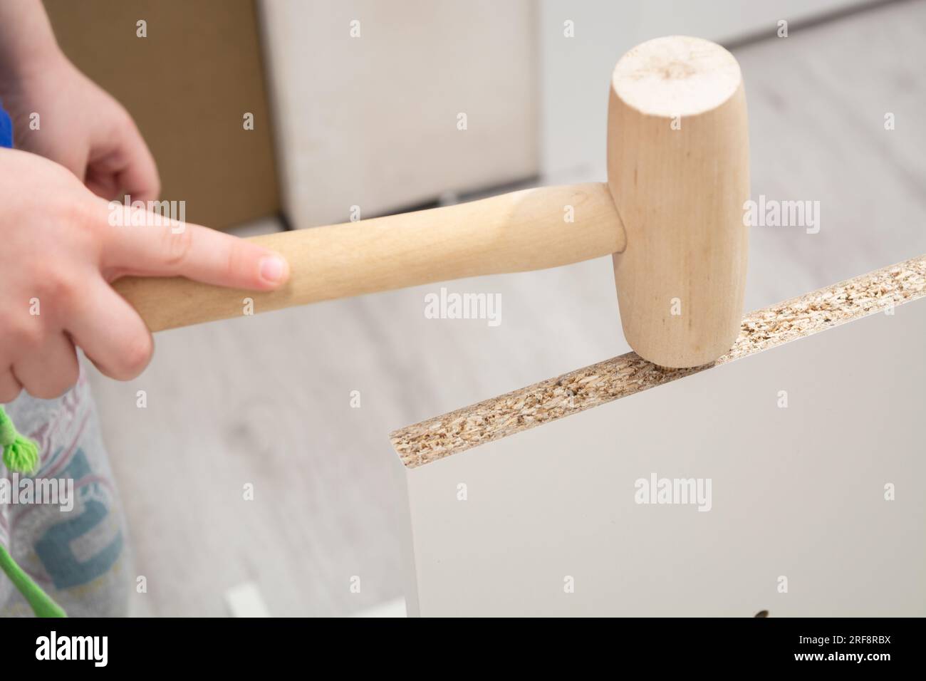 Furniture assembly worker hammers hi-res stock photography and images ...