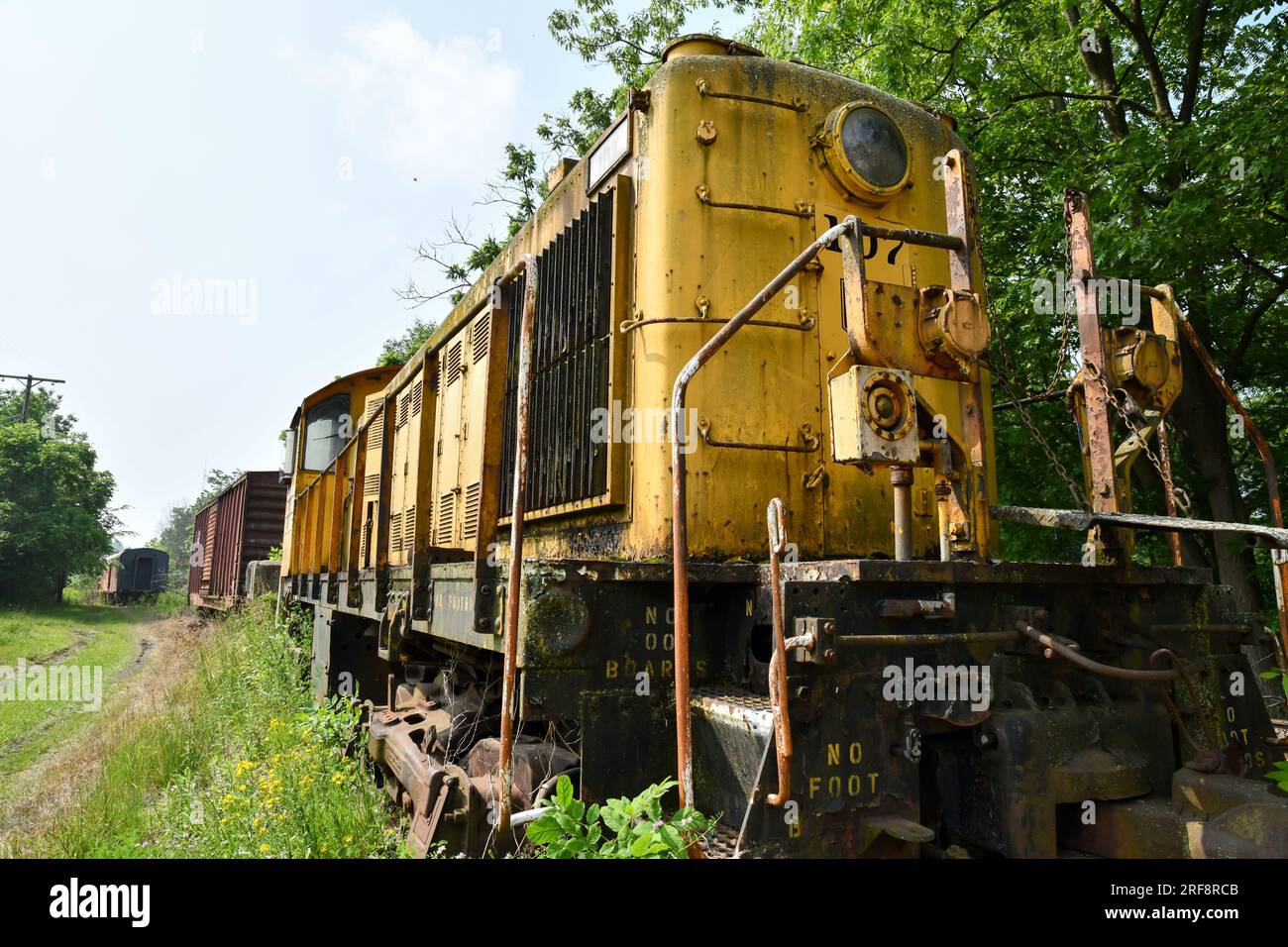 Weathered and old abandoned locomotive train car Stock Photo - Alamy
