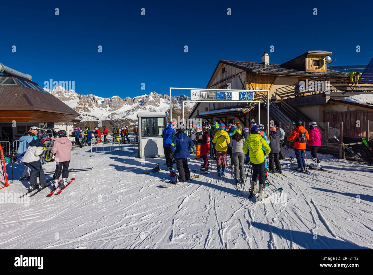 Falcade, Italy - February 15, 2023: At a lift station in the mountains ...