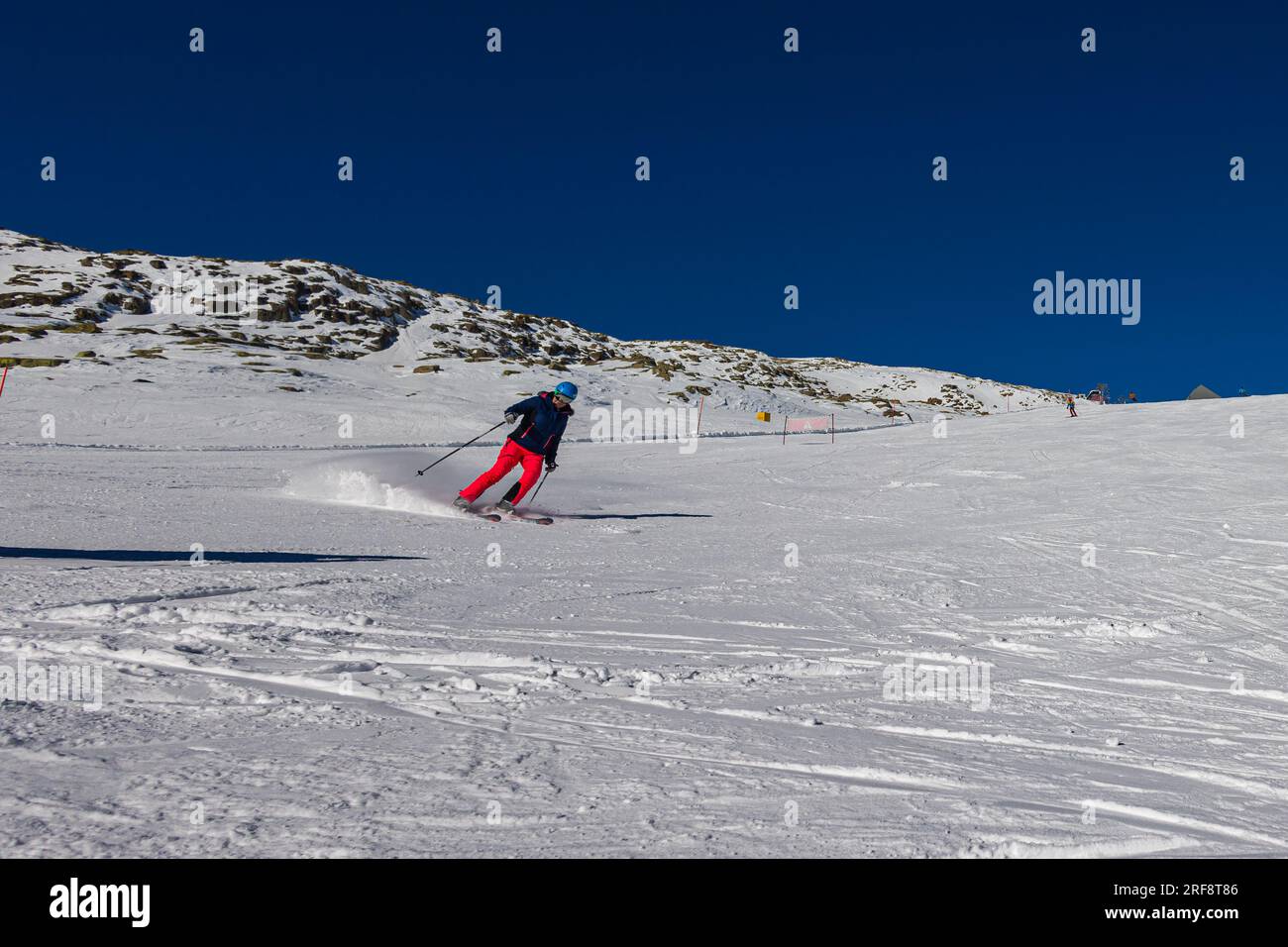 Skiers drive down hill hi-res stock photography and images - Alamy