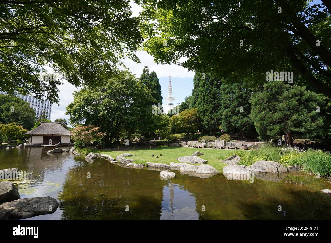 Hamburg, Germany. 13th July, 2023. View of the tea house (back l) and ...