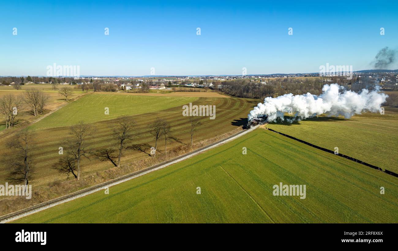 An Aerial View of a Steam Double-Header Freight , Passenger Combo Train ...