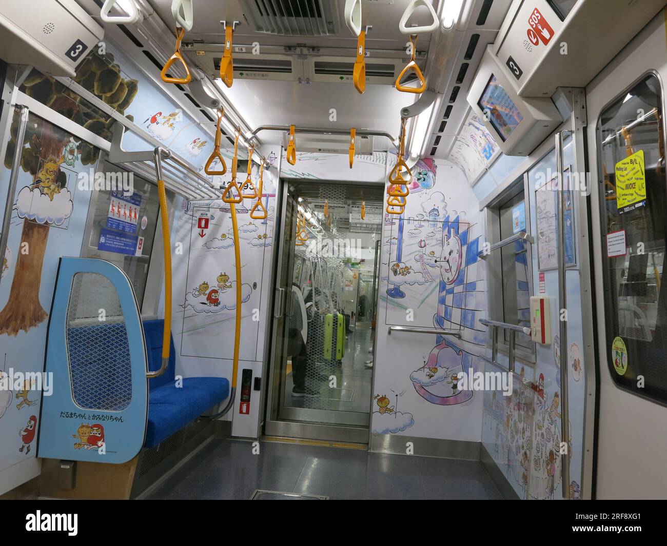 View of the interior of an empty train carriage on the Tokyo Metro ...