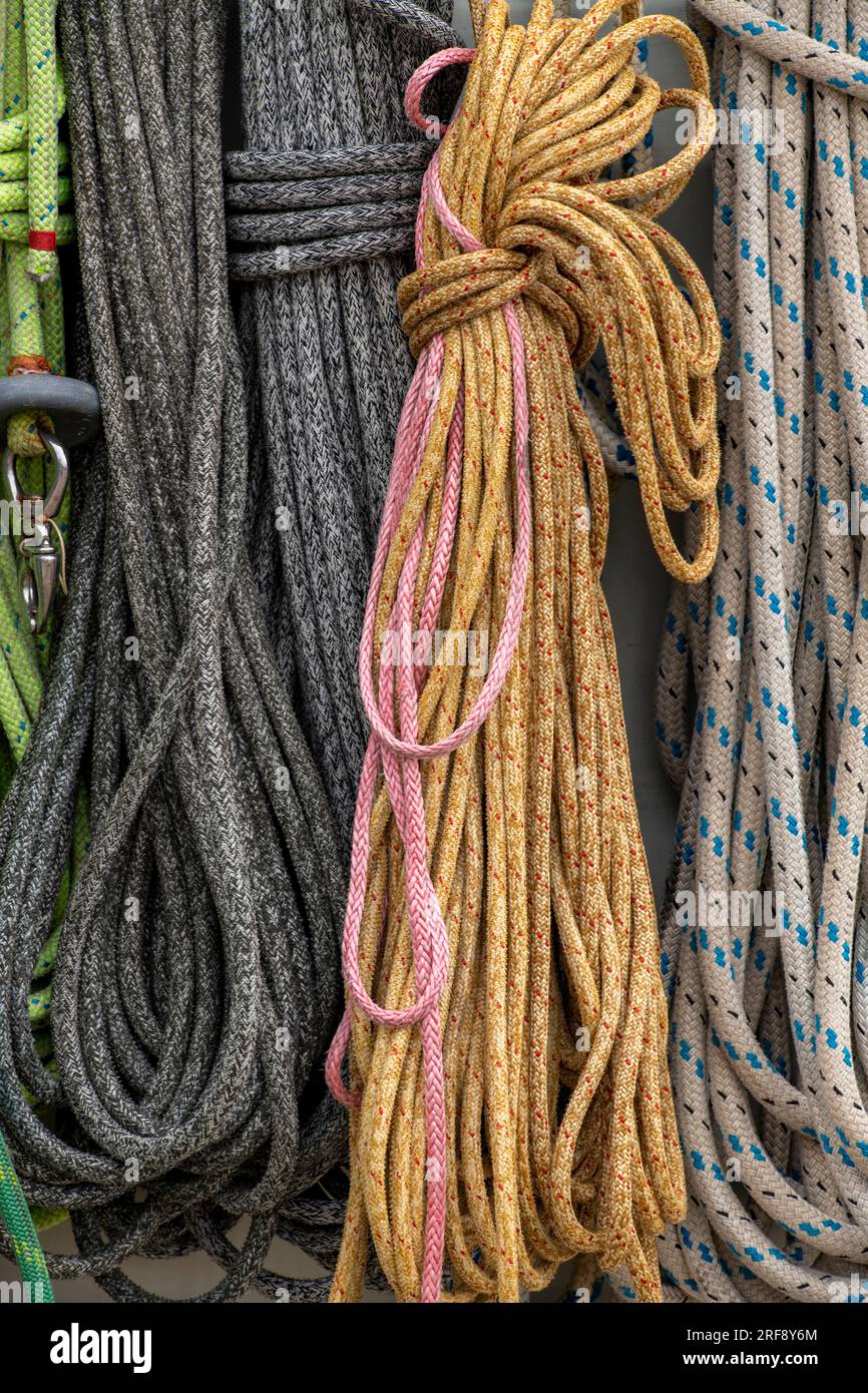 selection of colourful yachting ropes hanging ready for use Stock Photo ...