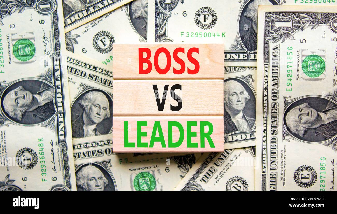 Boss vs leader symbol. Concept words Boss vs versus leader on wooden ...