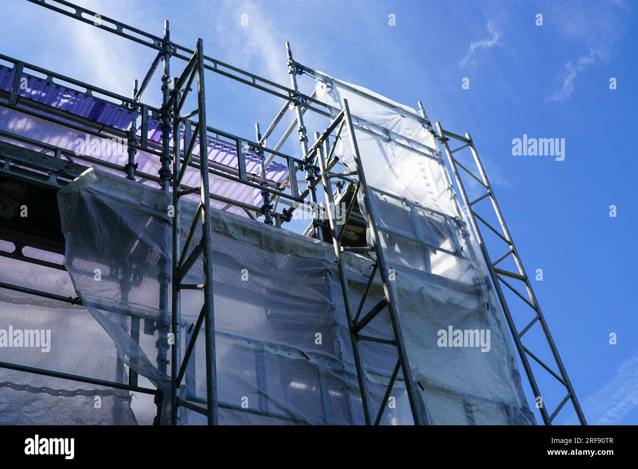 Abstract tubular modular metal scaffold construction frame with safety ...