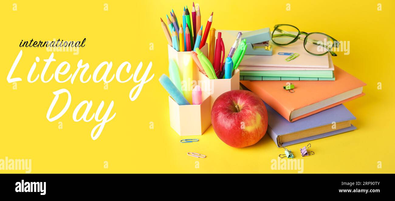 Banner for International Literacy Day with books and school stationery ...