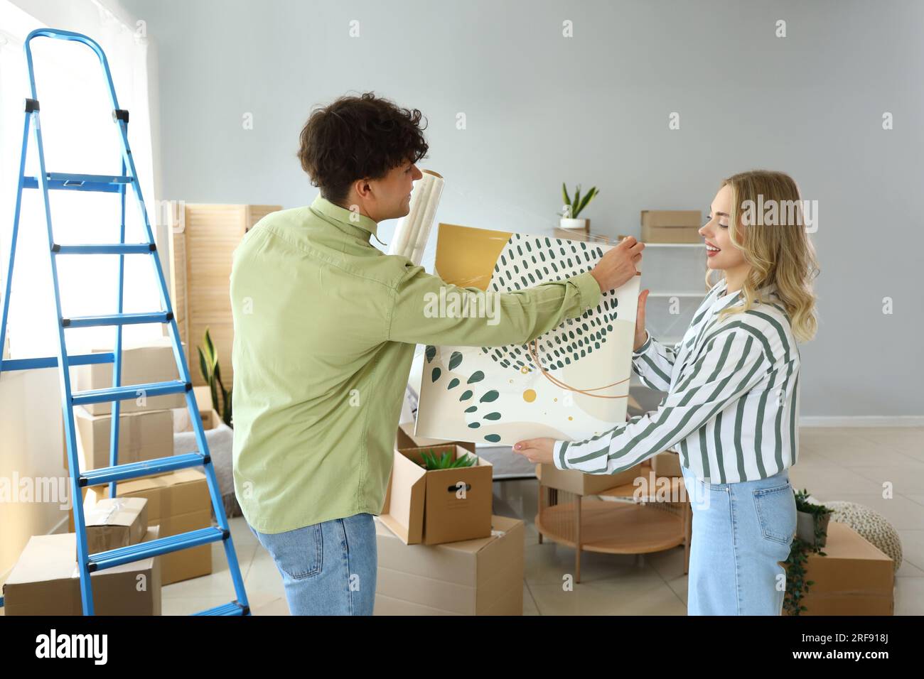 Person packing painting real hi-res stock photography and images - Alamy