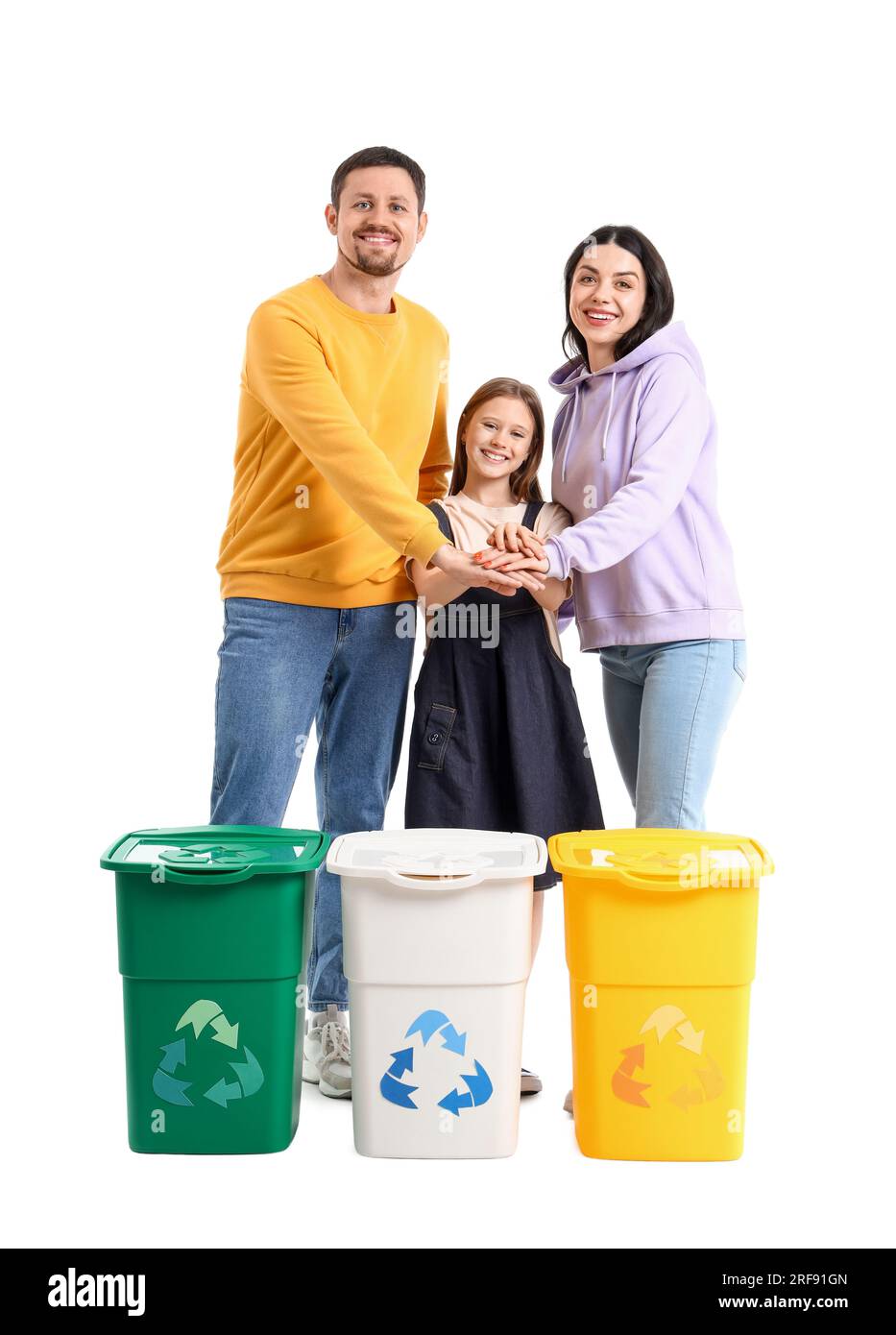 Family with recycle bins putting hands together on white background ...