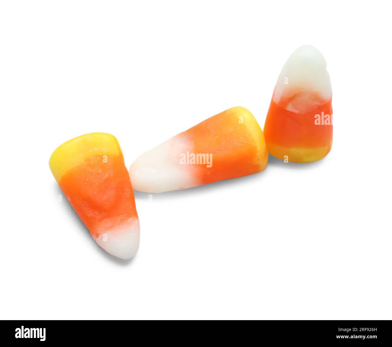 Tasty Halloween candy corns on white background Stock Photo - Alamy