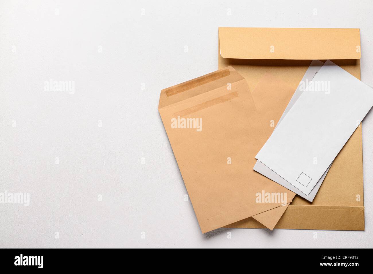 Letters and envelopes on light background Stock Photo - Alamy