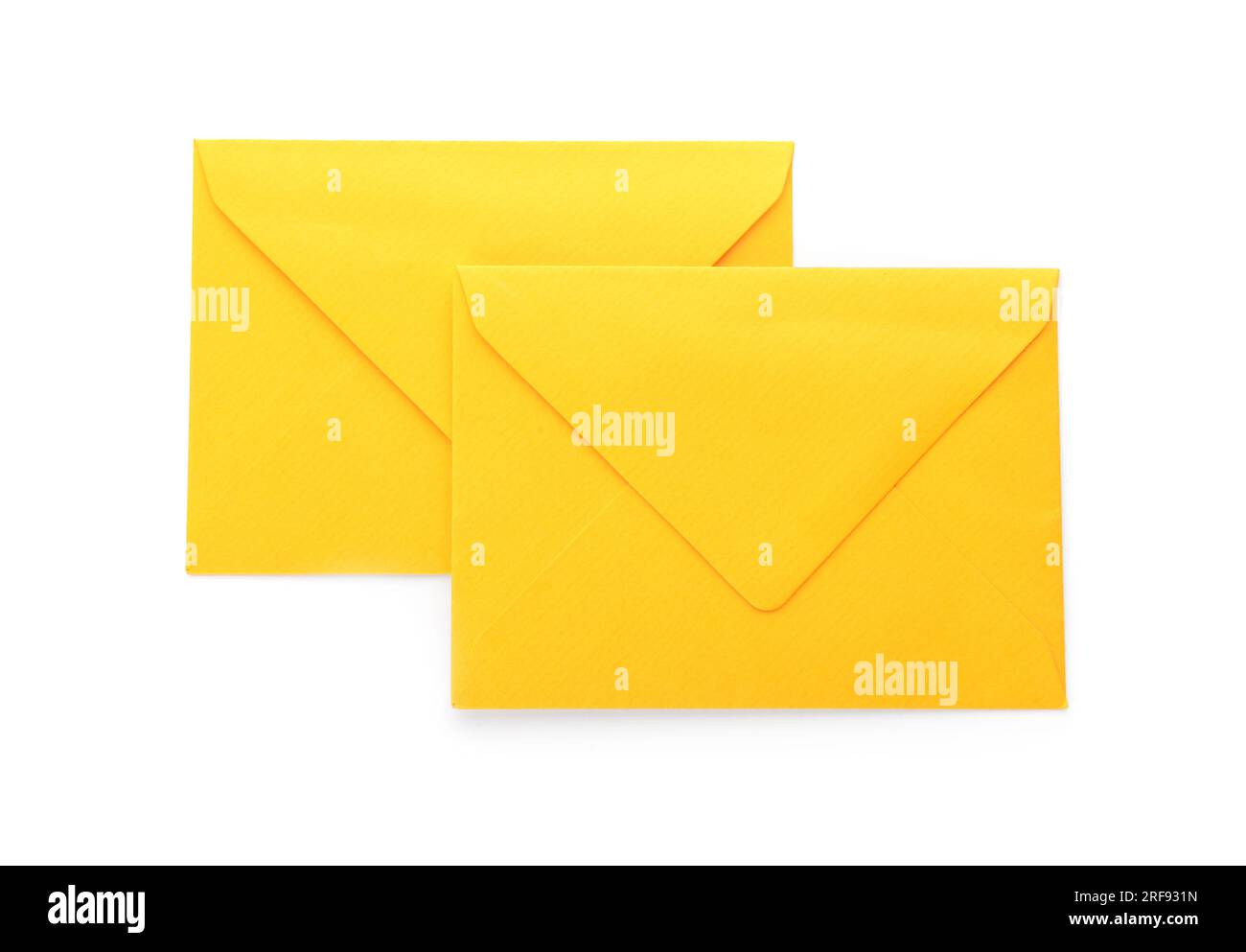 Yellow envelopes isolated on white background Stock Photo - Alamy