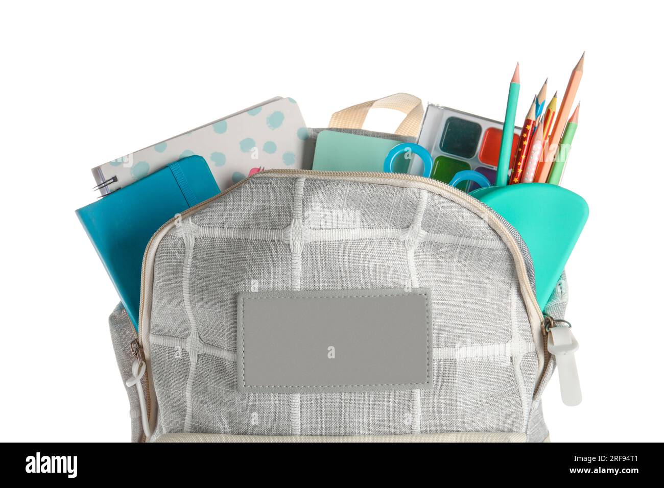 Grey school backpack with notebooks and pencils on white background ...