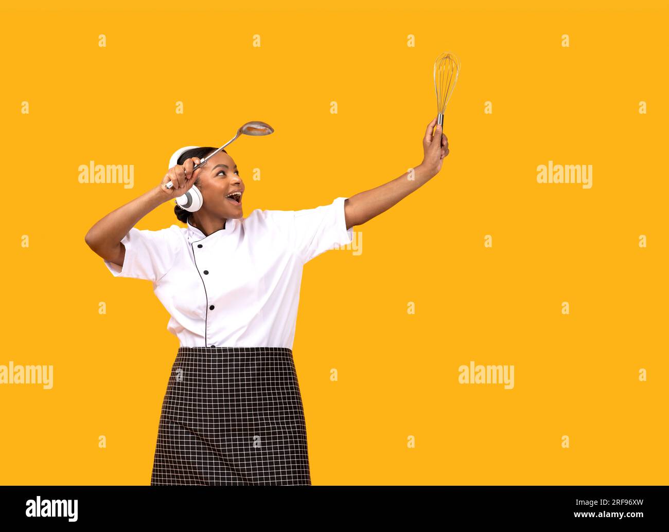 Professional baker wearing black hi-res stock photography and images ...