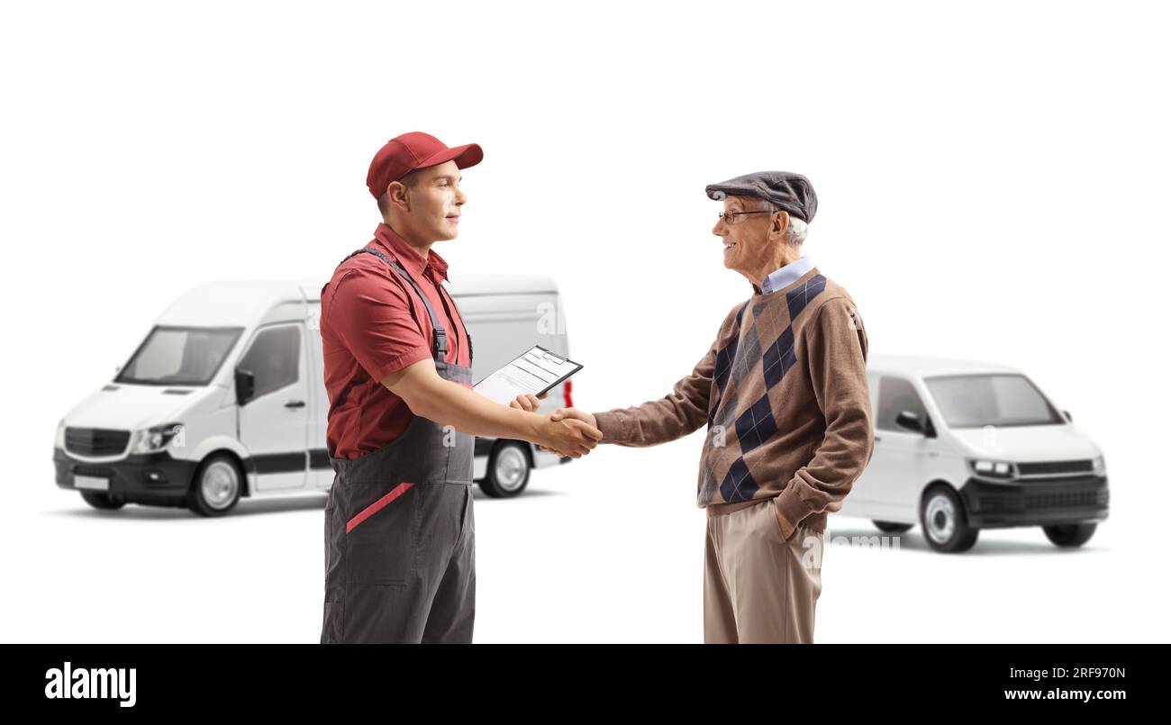 Worker with a van shaking hands with a senior man isolated on white ...