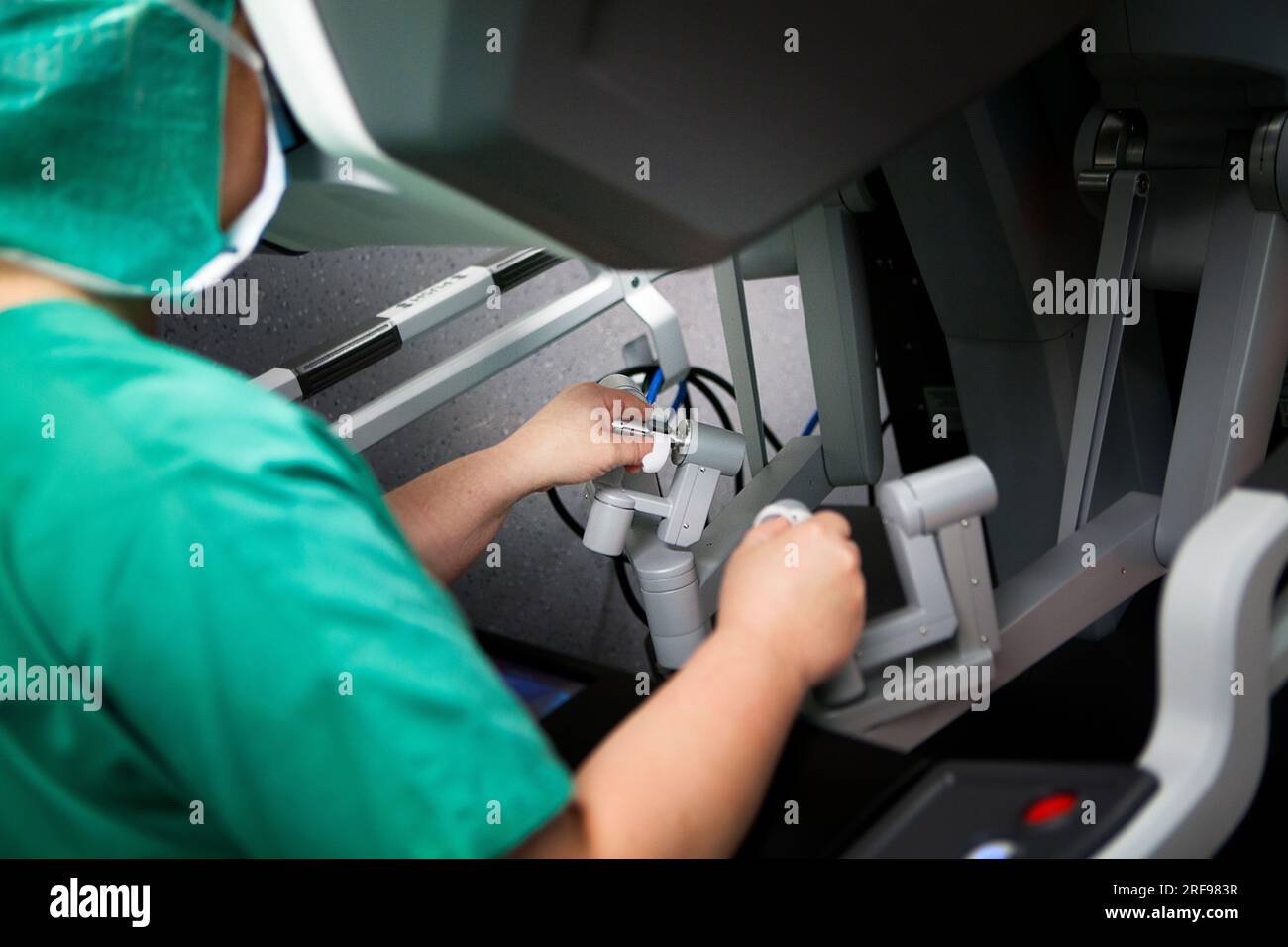 Hysterectomy in the operating room with a robot controlled by a surgeon ...