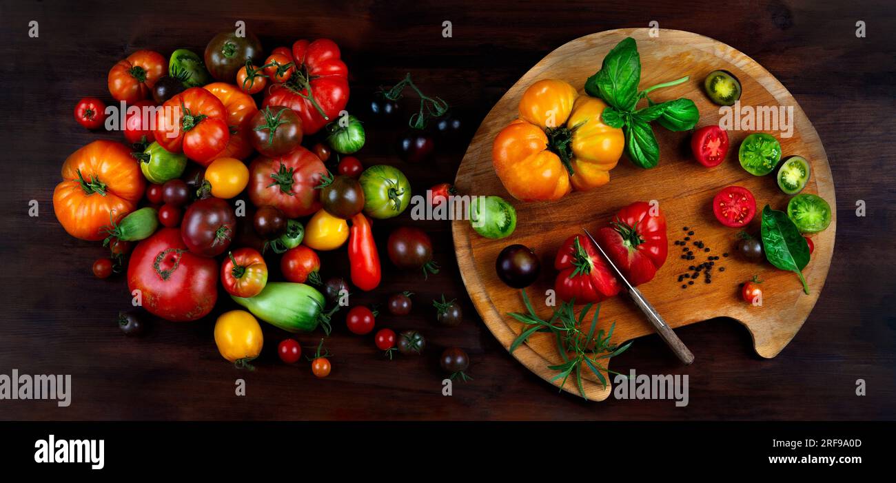 Old tomatoes seen from above, denser on the left side Stock Photo - Alamy