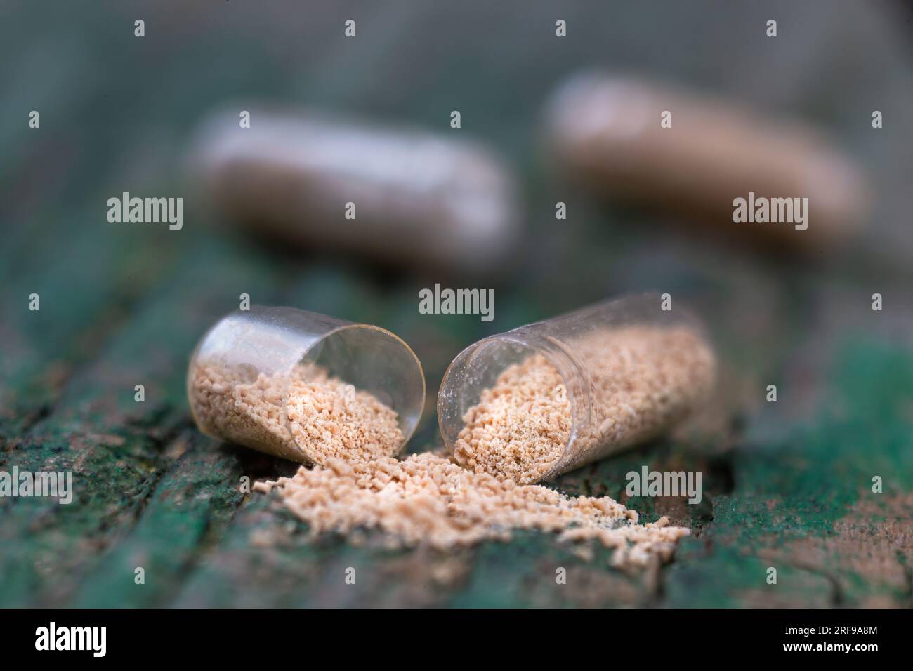 Capsule opened in half with its contents Stock Photo - Alamy