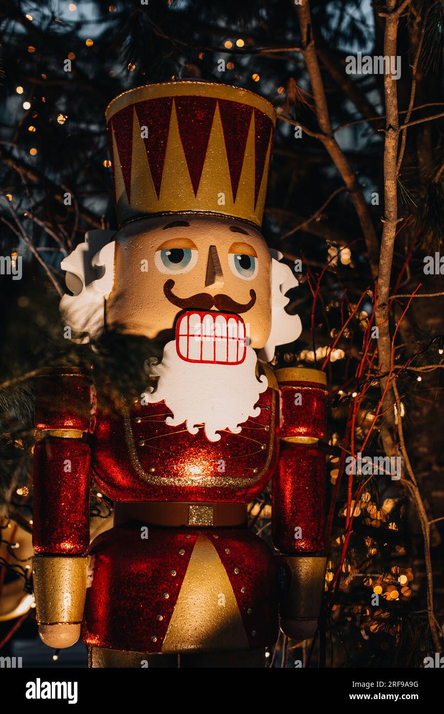 Christmas toy huge wooden Nutcracker with evening garland lights ...