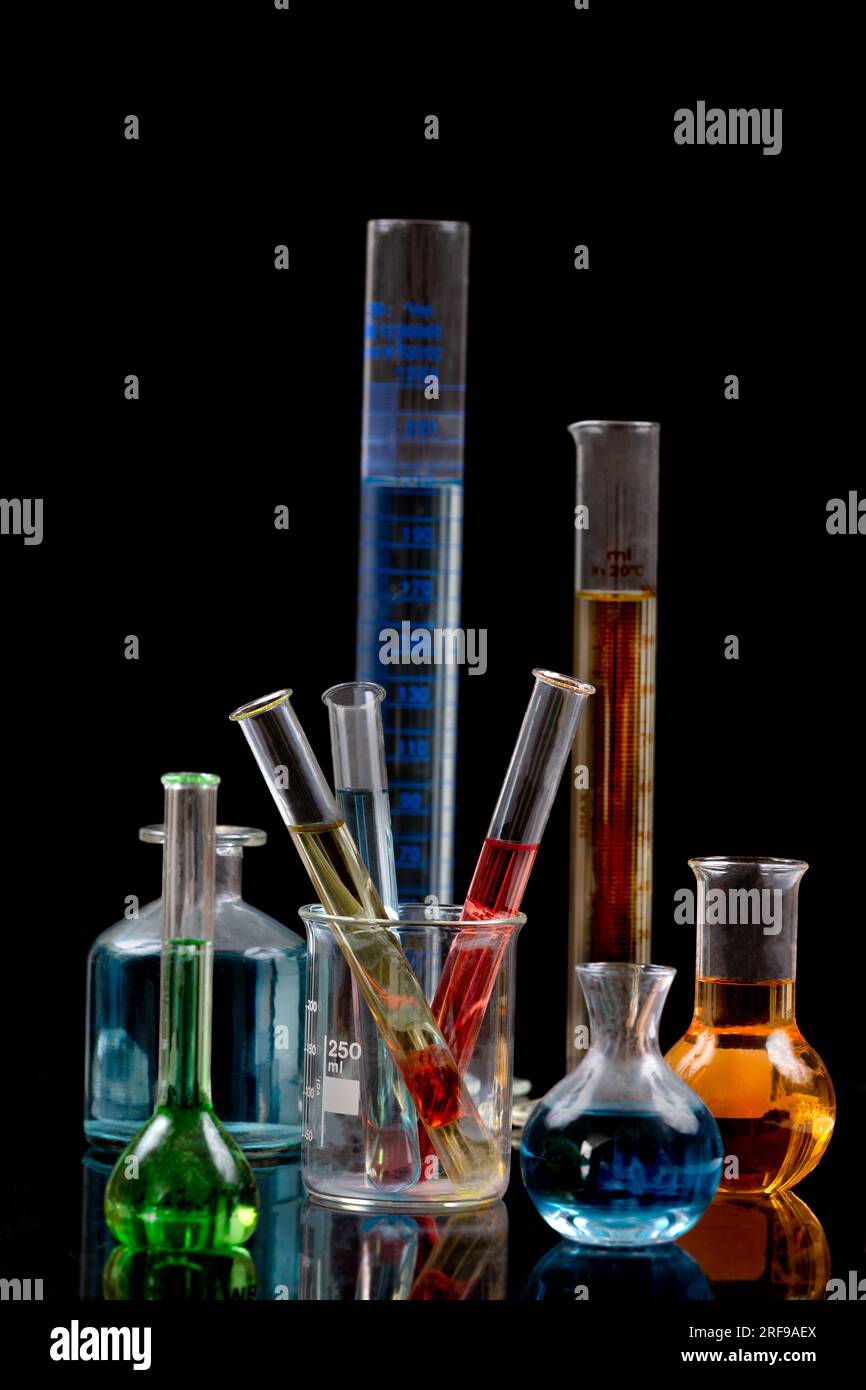 Set of laboratory glassware on plain background Stock Photo - Alamy