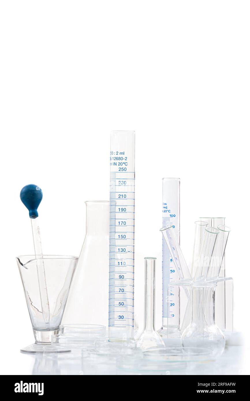 Set of laboratory glassware on plain background Stock Photo - Alamy