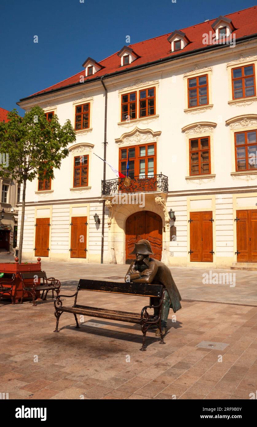 Napolean soldier statue leaning on a bench in the old town of ...