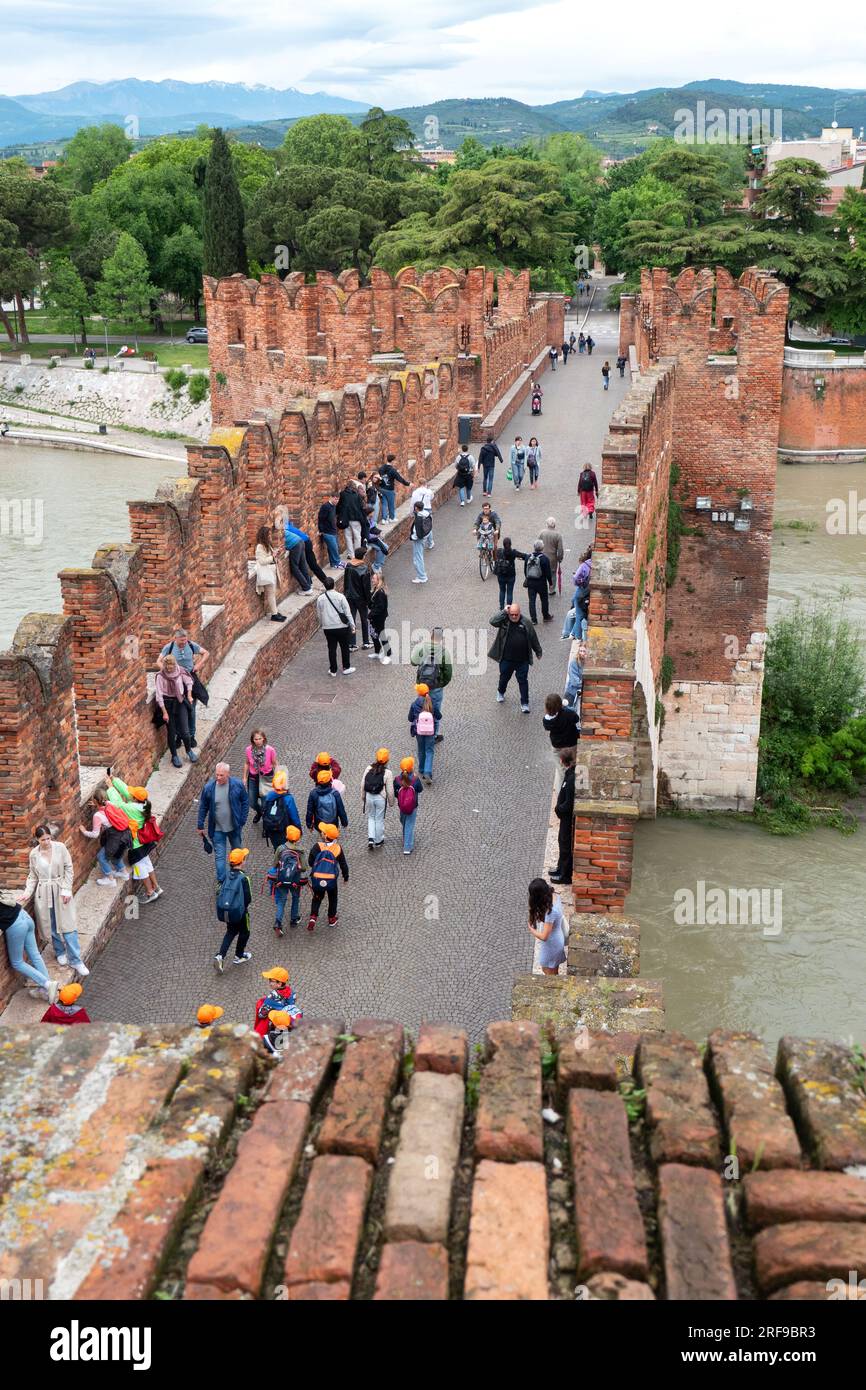 Verona tourists on the Castelvecchio Bridge aka the Scaliger Bridge; a ...