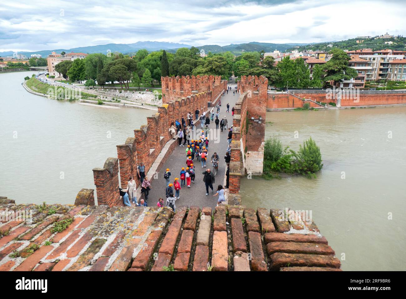 Verona tourists on the Castelvecchio Bridge aka the Scaliger Bridge; a ...
