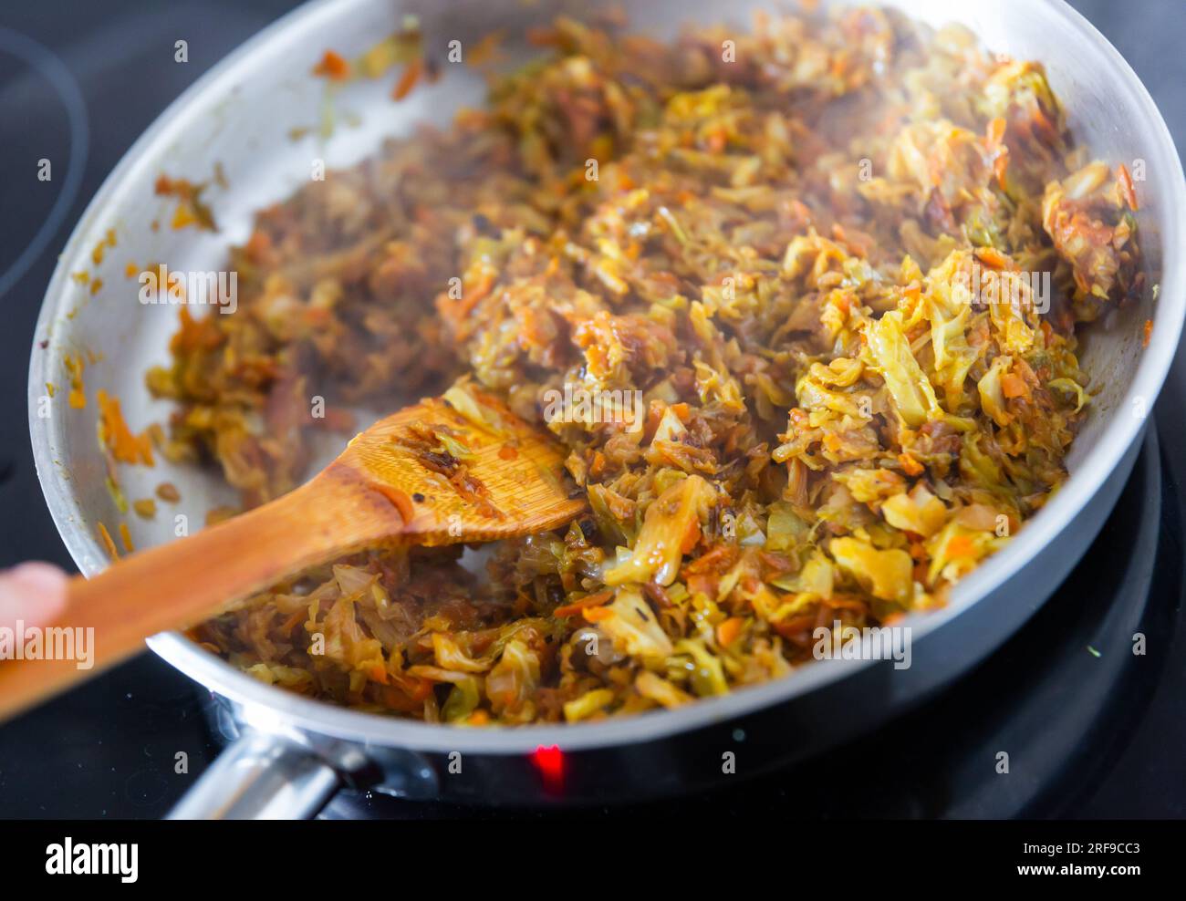 Homemade braised white cabbage with vegetables Stock Photo - Alamy