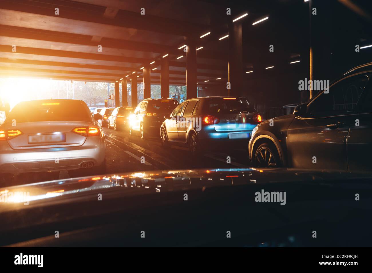 road traffic jam and congestion with cars at rush hour under bridge ...