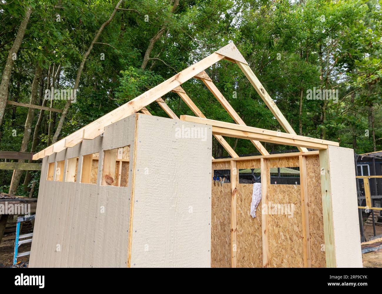 Storage shed under construction being built Stock Photo - Alamy