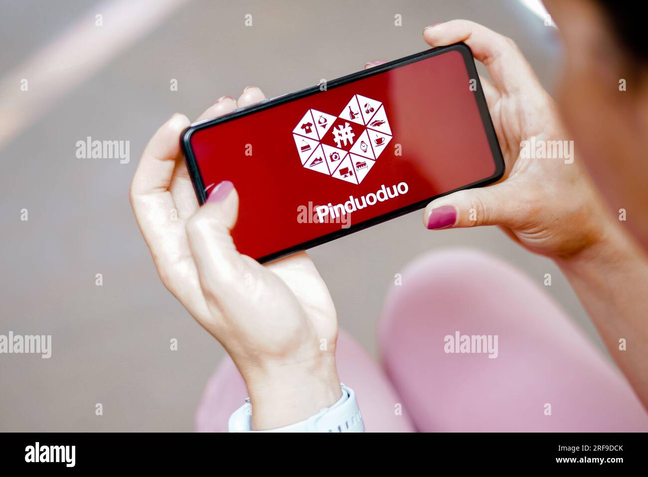 In this photo illustration, the Pinduoduo logo is seen displayed on a ...