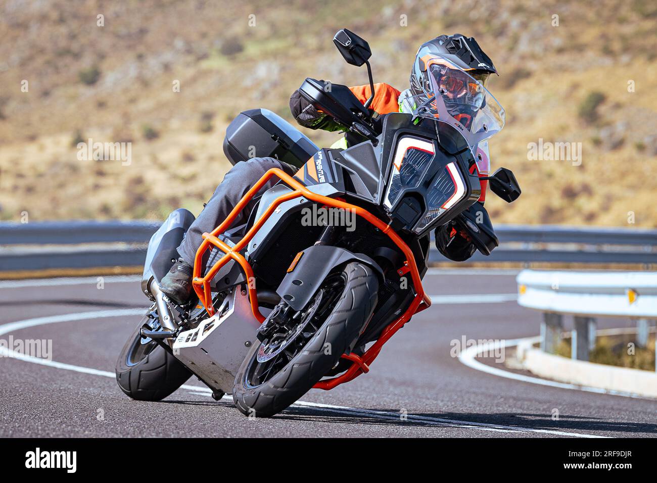 motorcyclist taking a sharp curve on his bike. Photograph taken in the ...