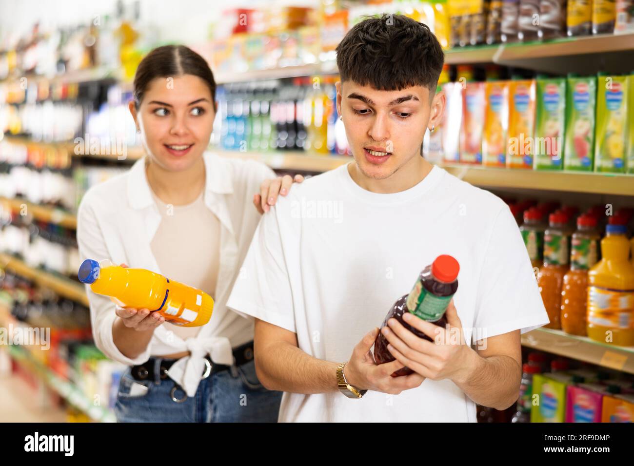 Fizzy drinks woman shop hi-res stock photography and images - Alamy