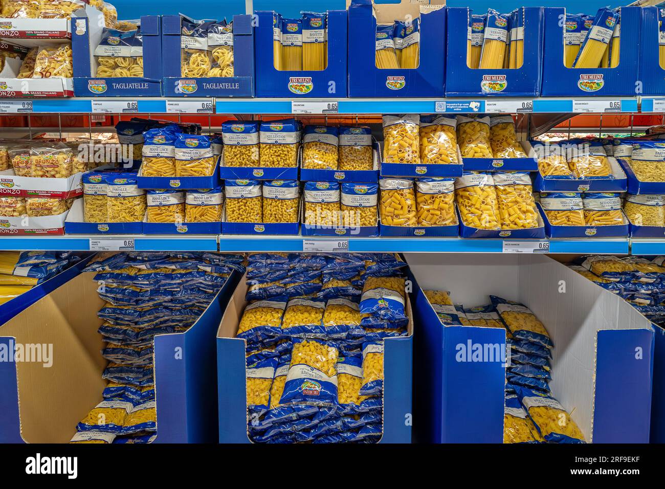 Italy - July, 29, 2023: pasta of various types and shapes in packages ...