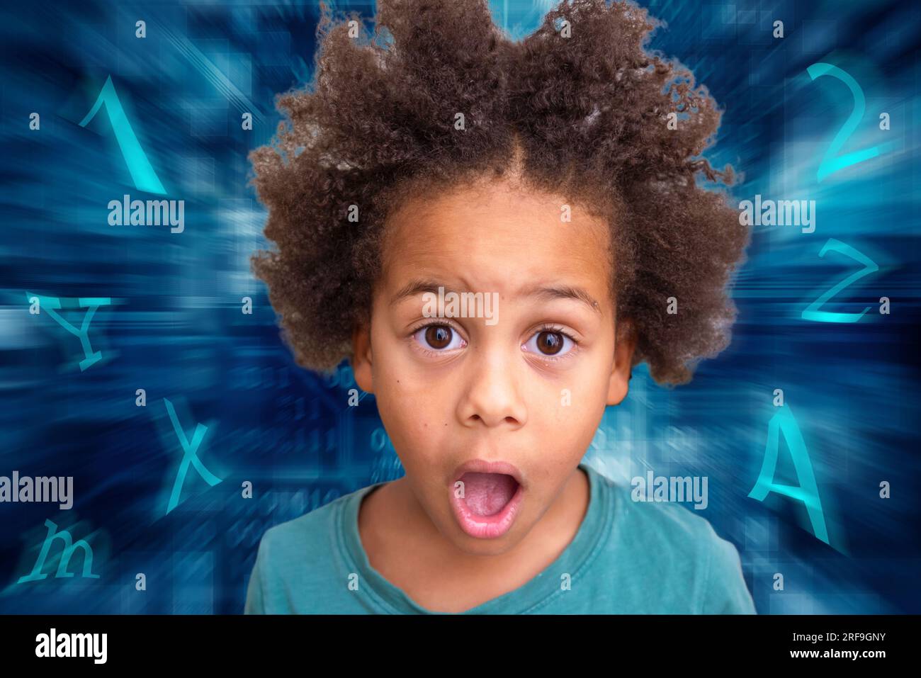 Surprised Shocked preschool boy in front of the blue technology ...