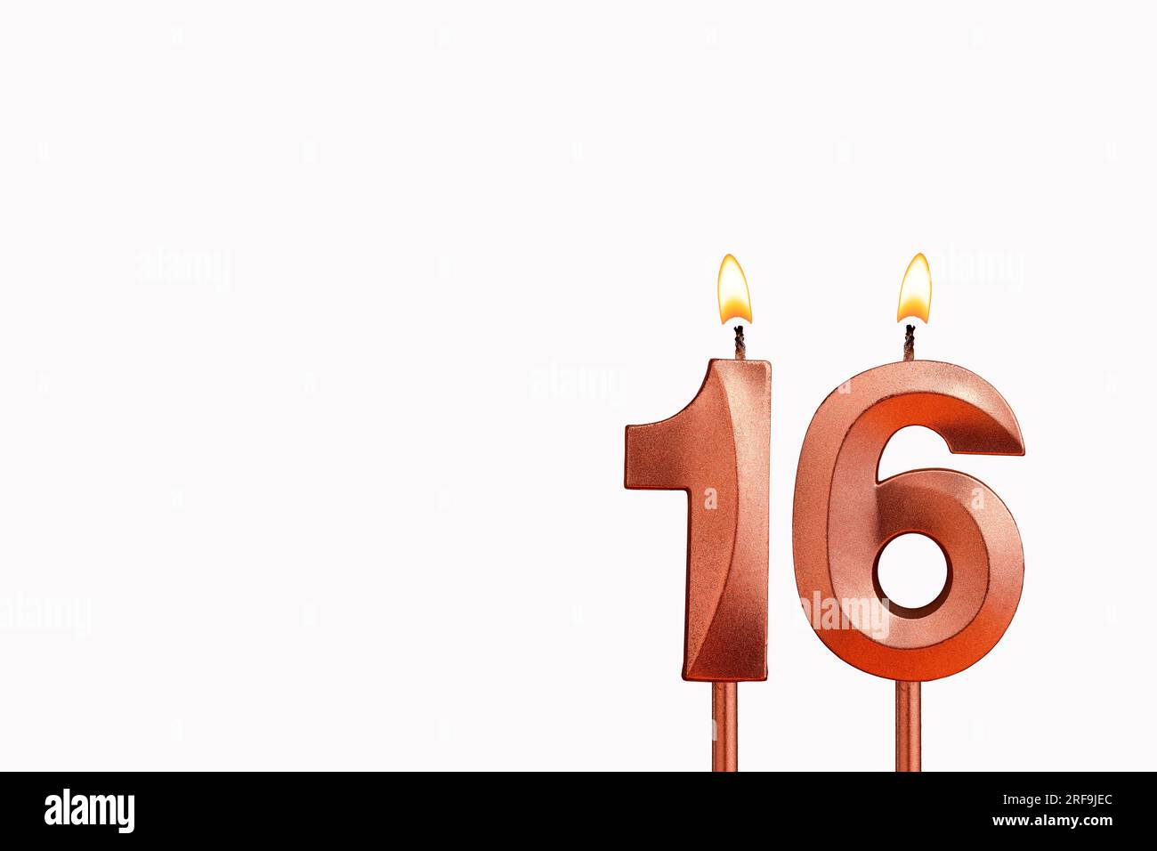 Burning candle number 16 for birthday on white background Stock Photo ...
