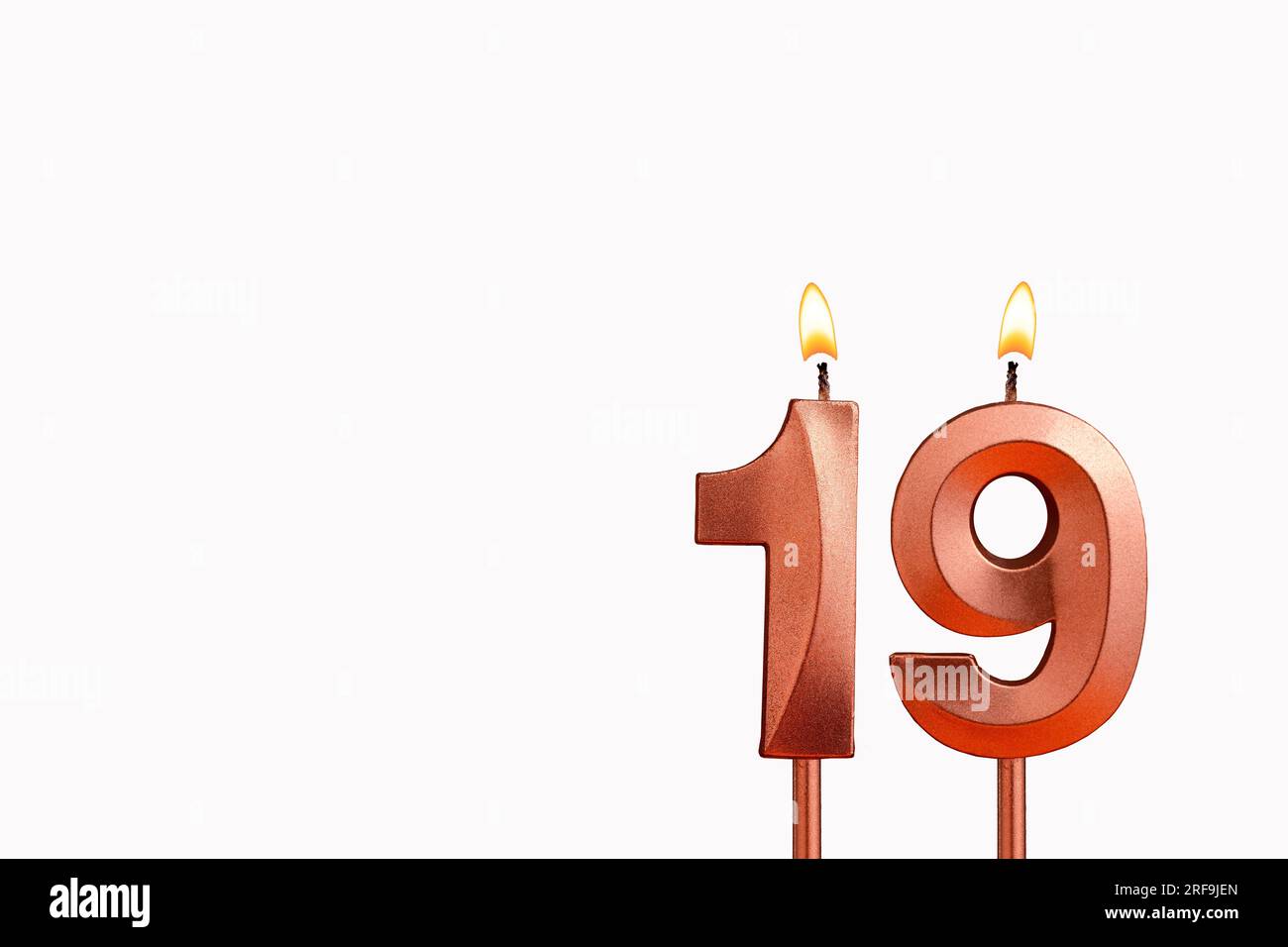 Birthday candle number 19 on white background Stock Photo - Alamy