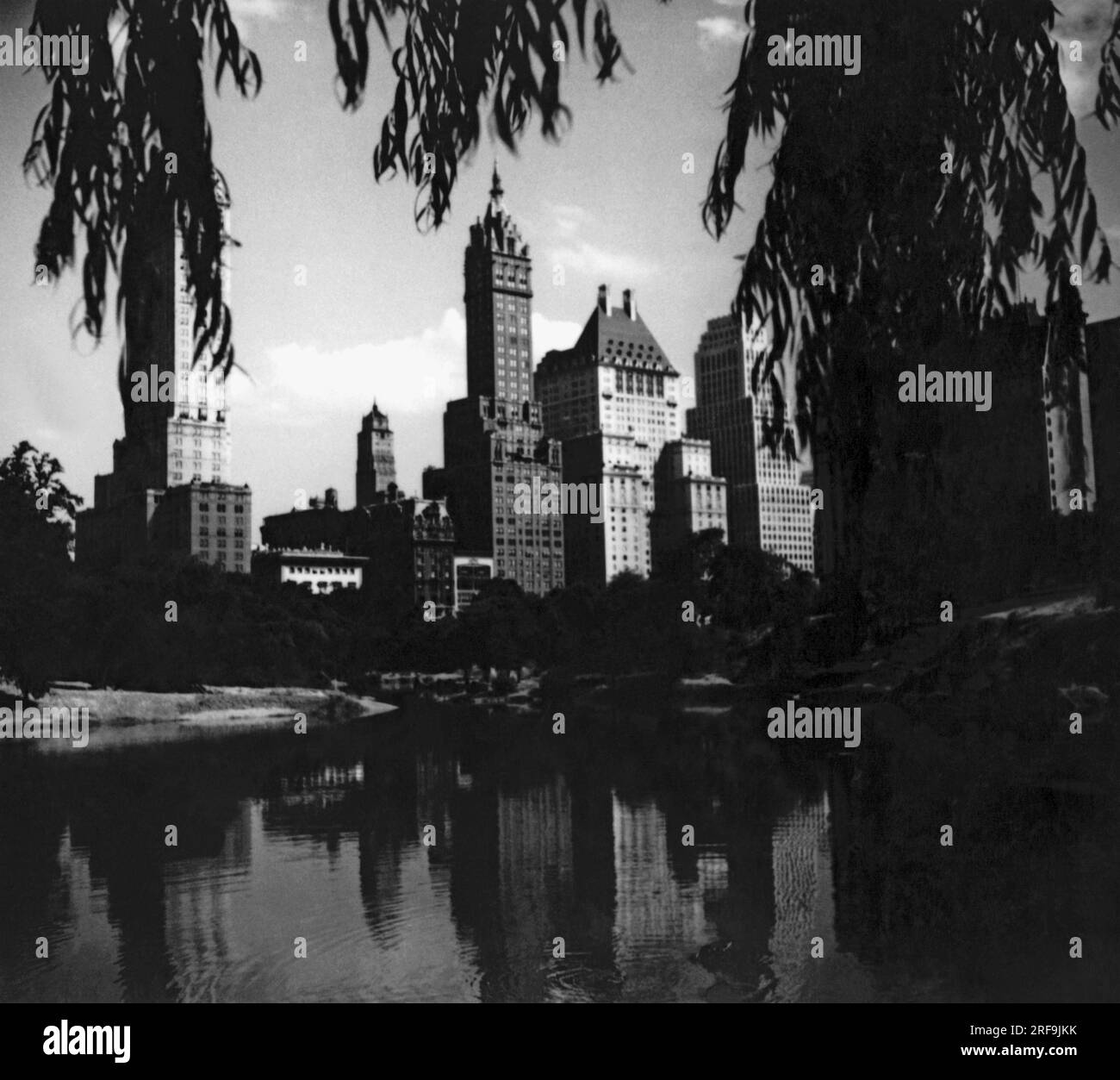 New York, New York: c. 1927 The evening view from Central Park of the new Hotel Netherland on ...