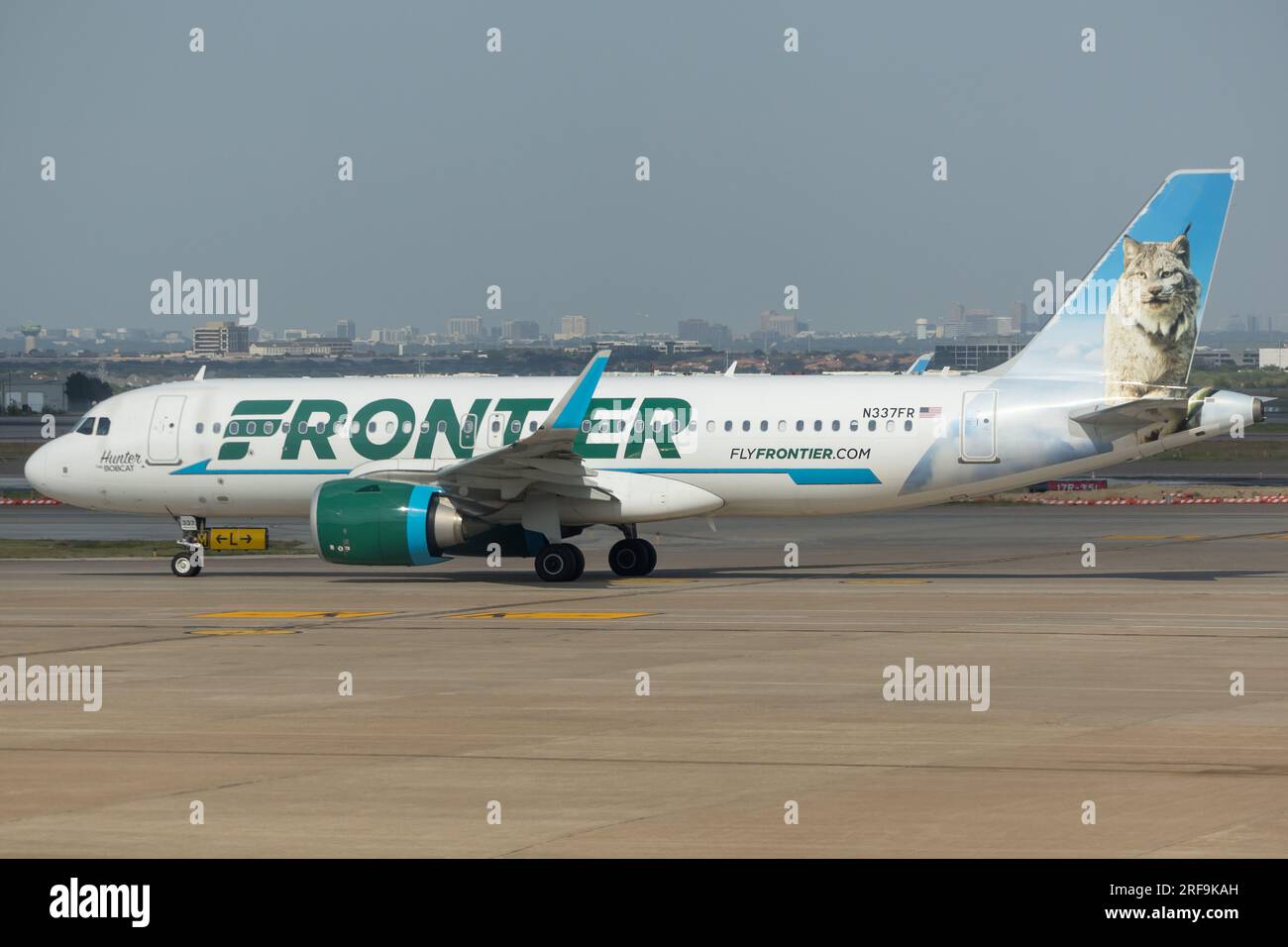 A Frontier plane is seen at the Dallas-Fort Worth International Airport ...