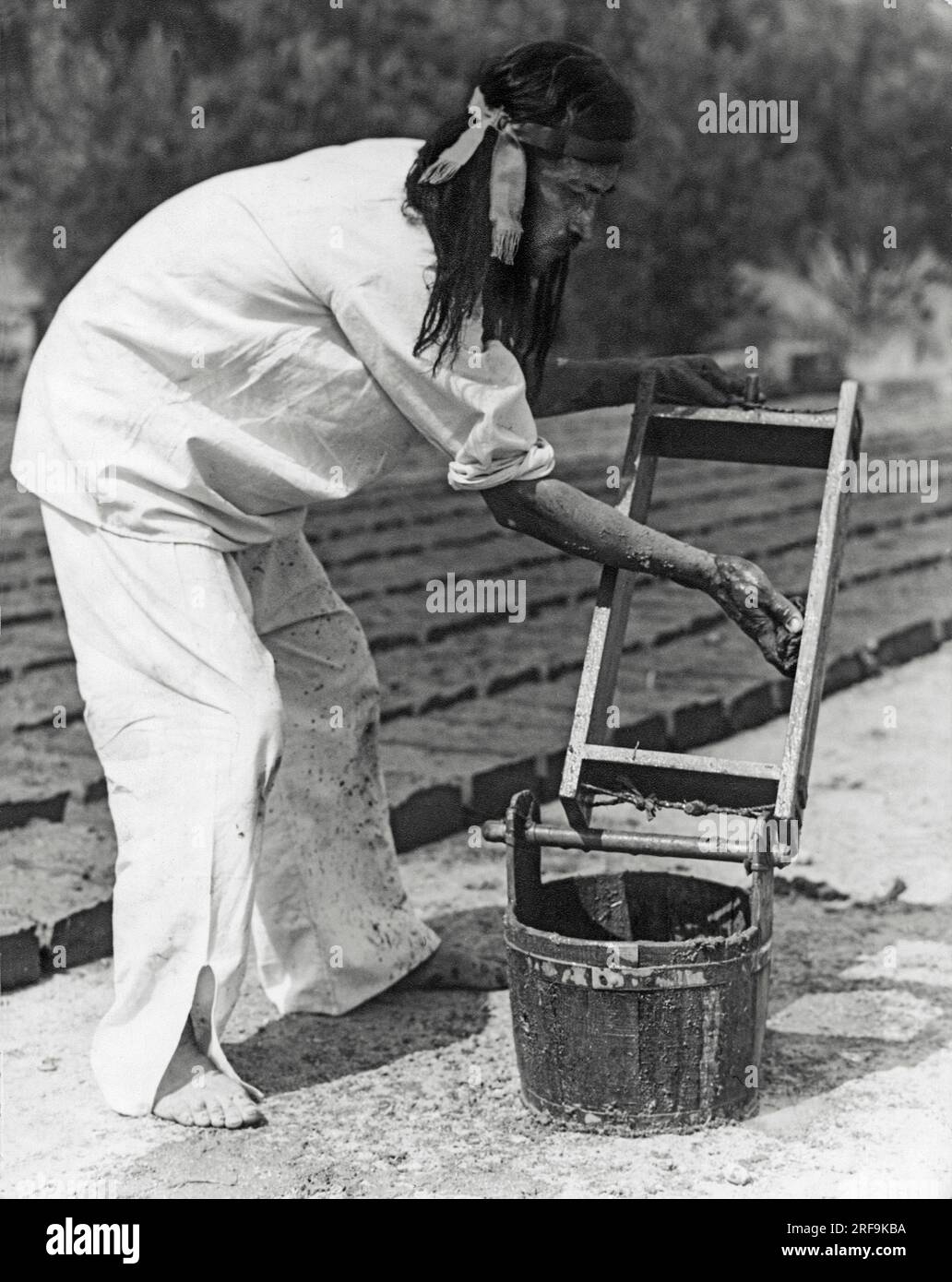California: 1930 After several bricks were formed the mold was ...
