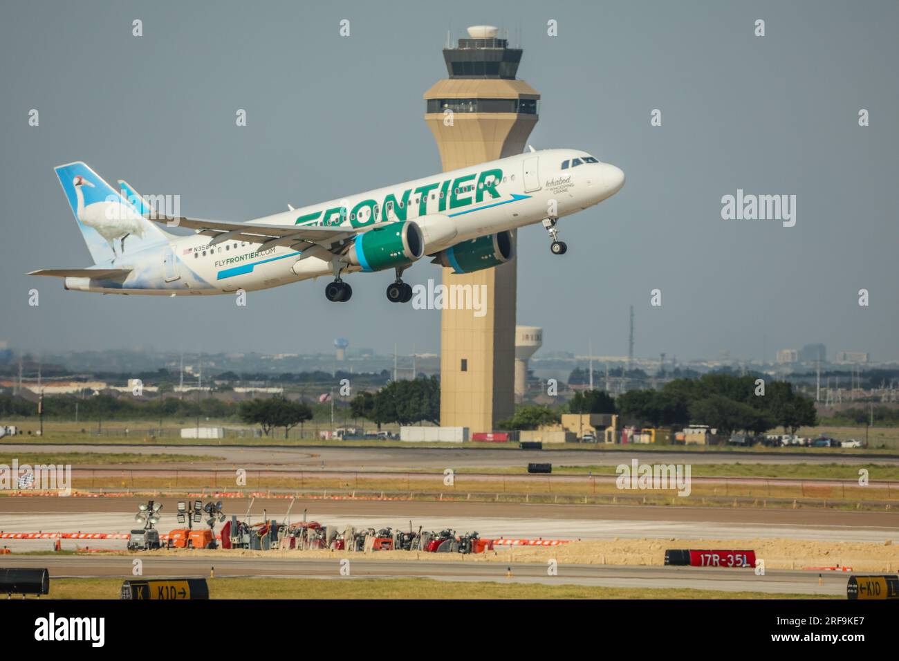 A Frontier plane is seen at the Dallas-Fort Worth International Airport ...