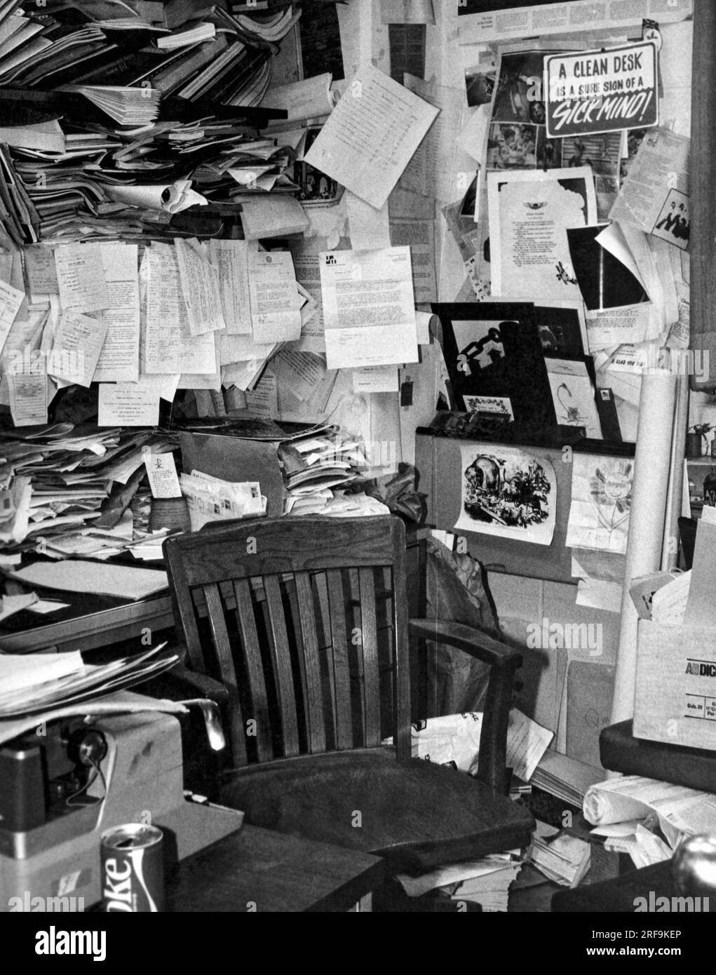 Messy cluttered office desk workspace Black and White Stock Photos ...