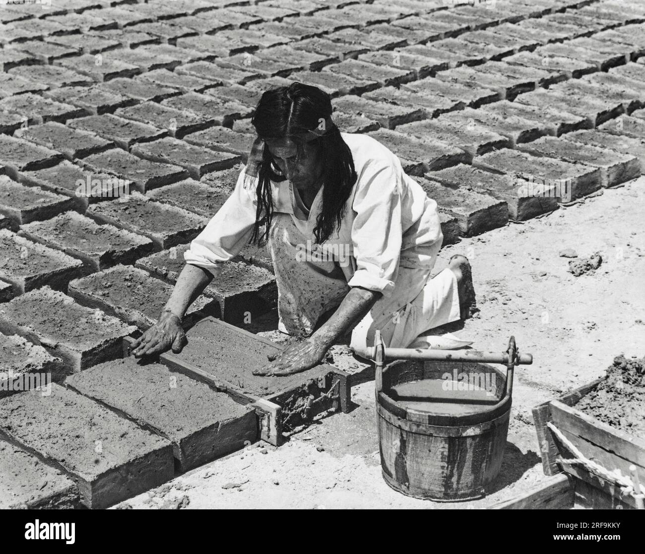 California: c. 1930 The padres taught the Indians to make the adobe ...