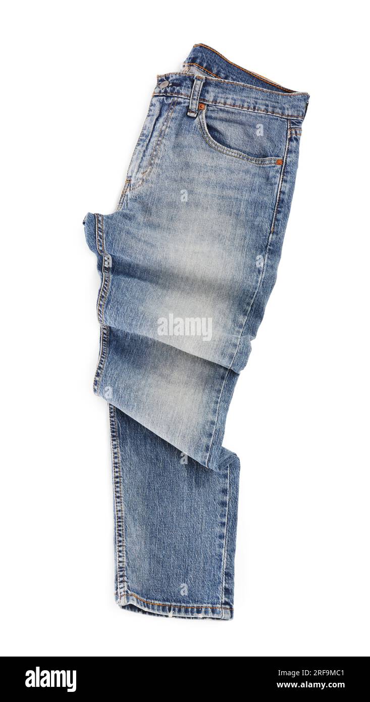 Rumpled blue jeans isolated on white, top view. Stylish clothes Stock ...